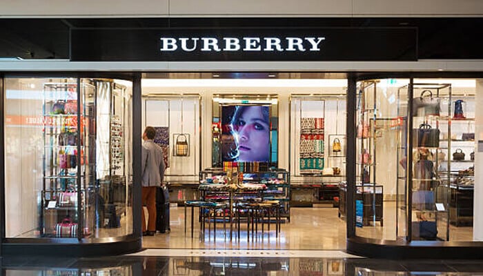 How did Burberry achieve success in the luxury industry?